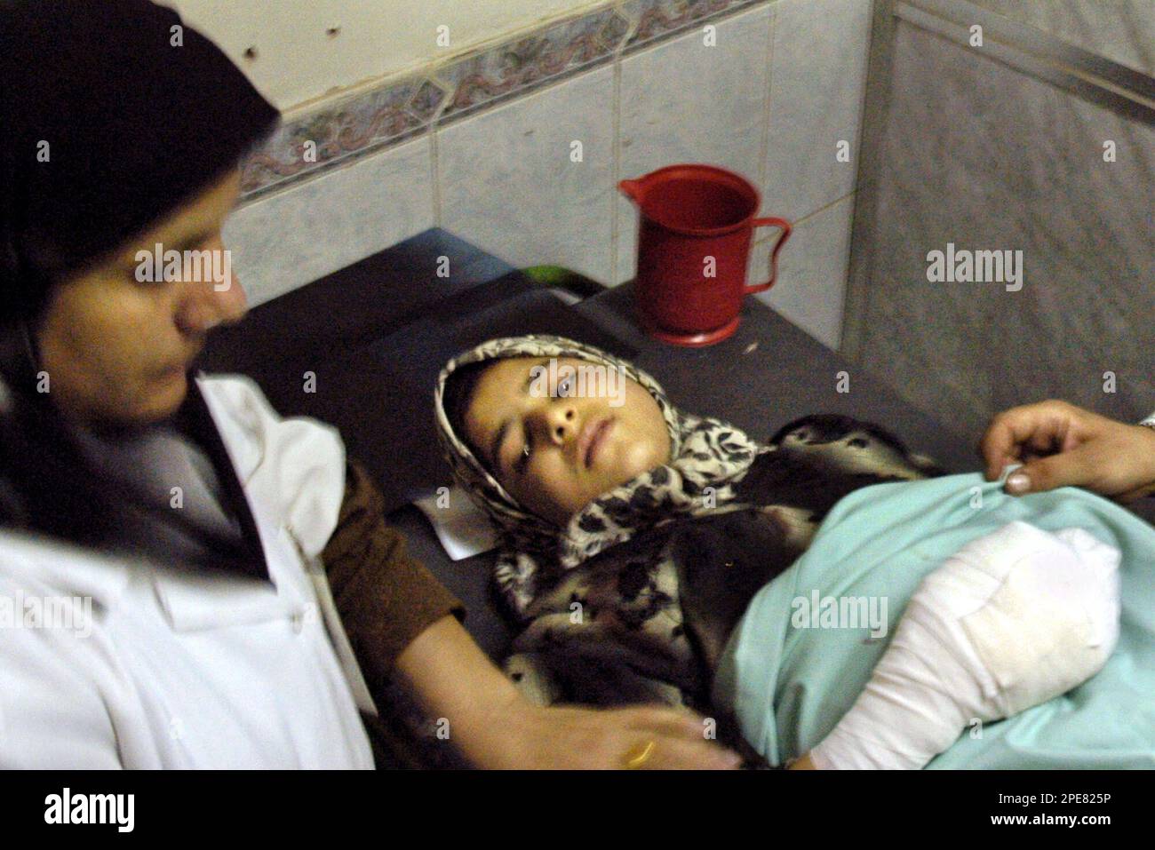 Iraqi Hanna Fadul lies in a Baghdad, Iraq hospital after she was ...