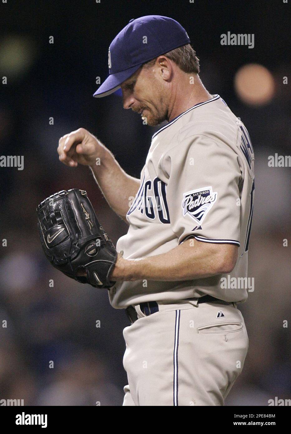 San Diego Padres starting pitcher Woody Williams reacts after giving up ...