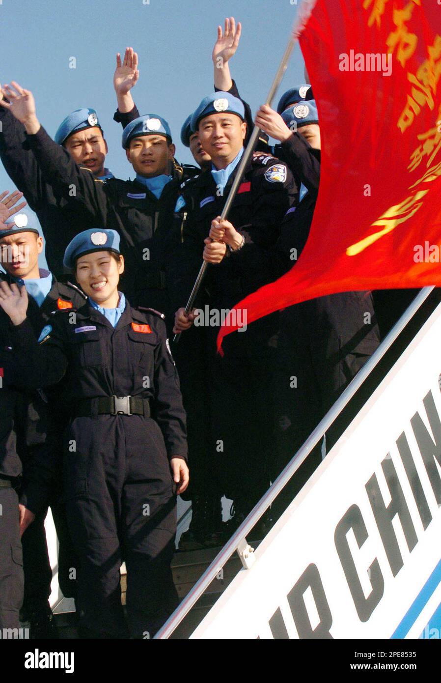 China's second batch of peacekeeping riot police board a plane at ...