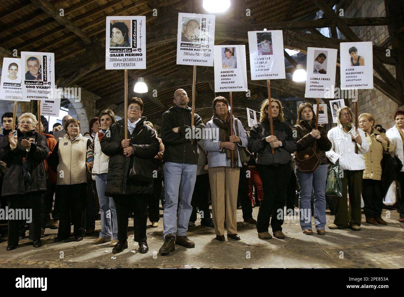 Relatives of prisoners of the armed Basque separatist group ETA hold up ...