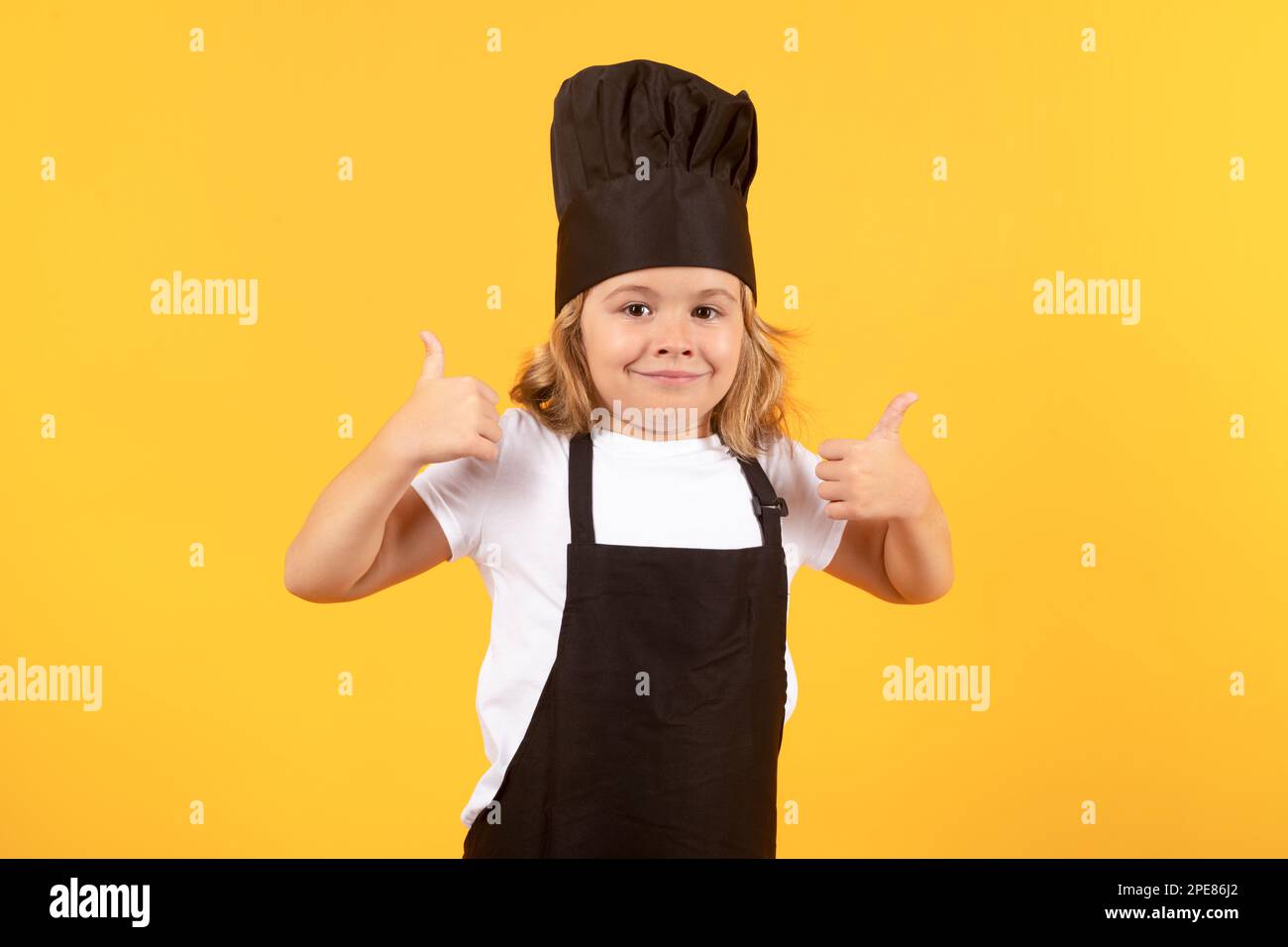 Cooking children. Chef kid boy making healthy food. Portrait of little ...