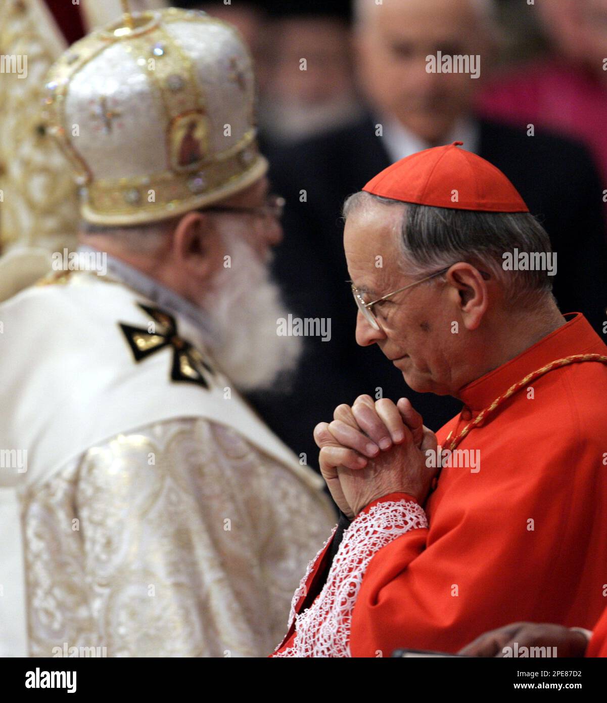 Cardinal Lubomyr Husar from Ukraine walks past next to Cardinal Silvano ...