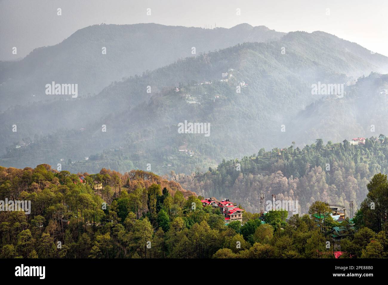 Smoke covered Himalayan mountains in Shimla Stock Photo - Alamy