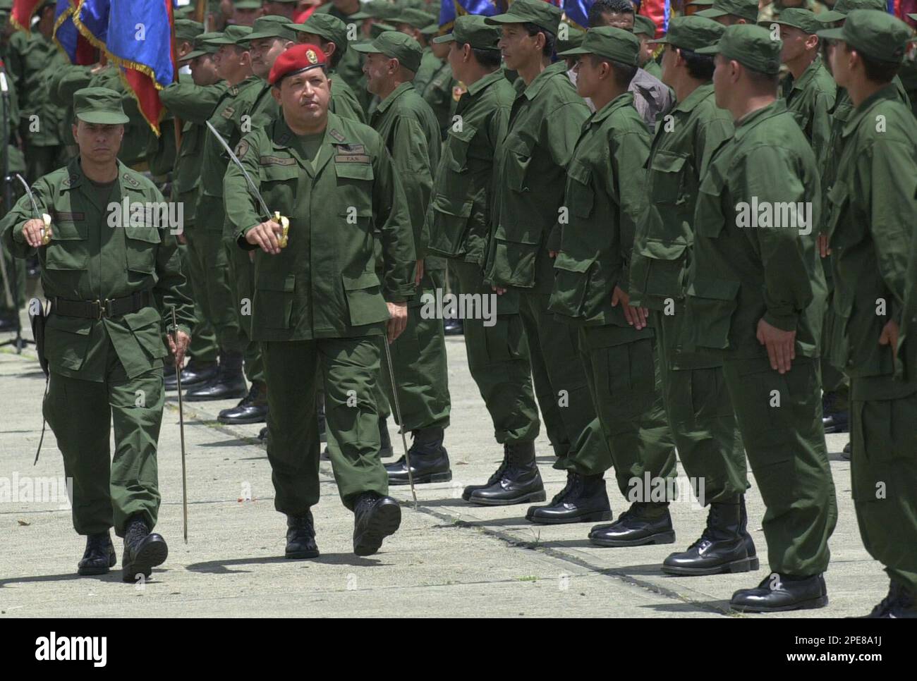 Venezuelan President Hugo Chavez, center, and General Commander of the ...