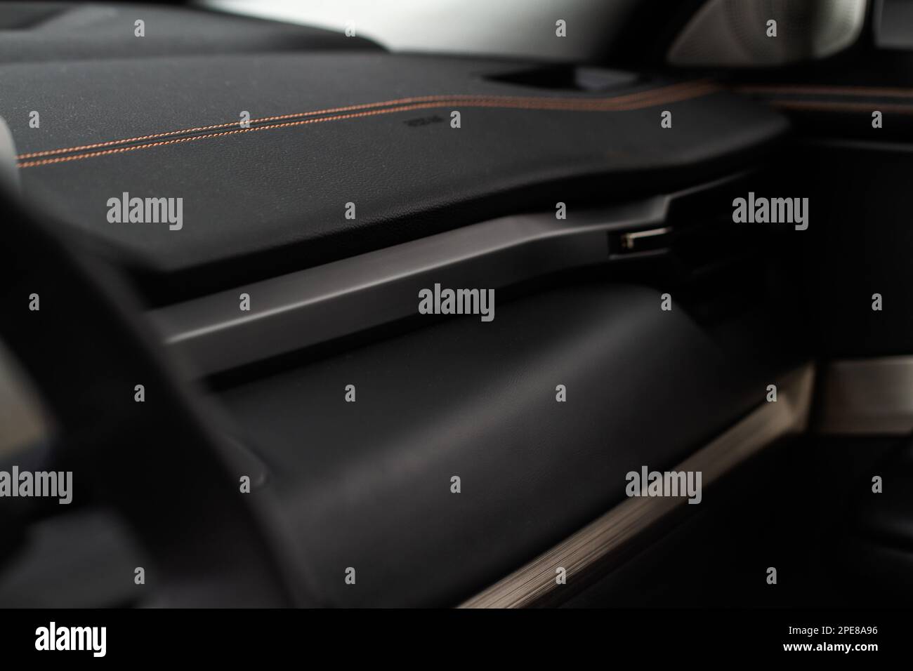 Modern car interior close up view with metallic and plastic details ...