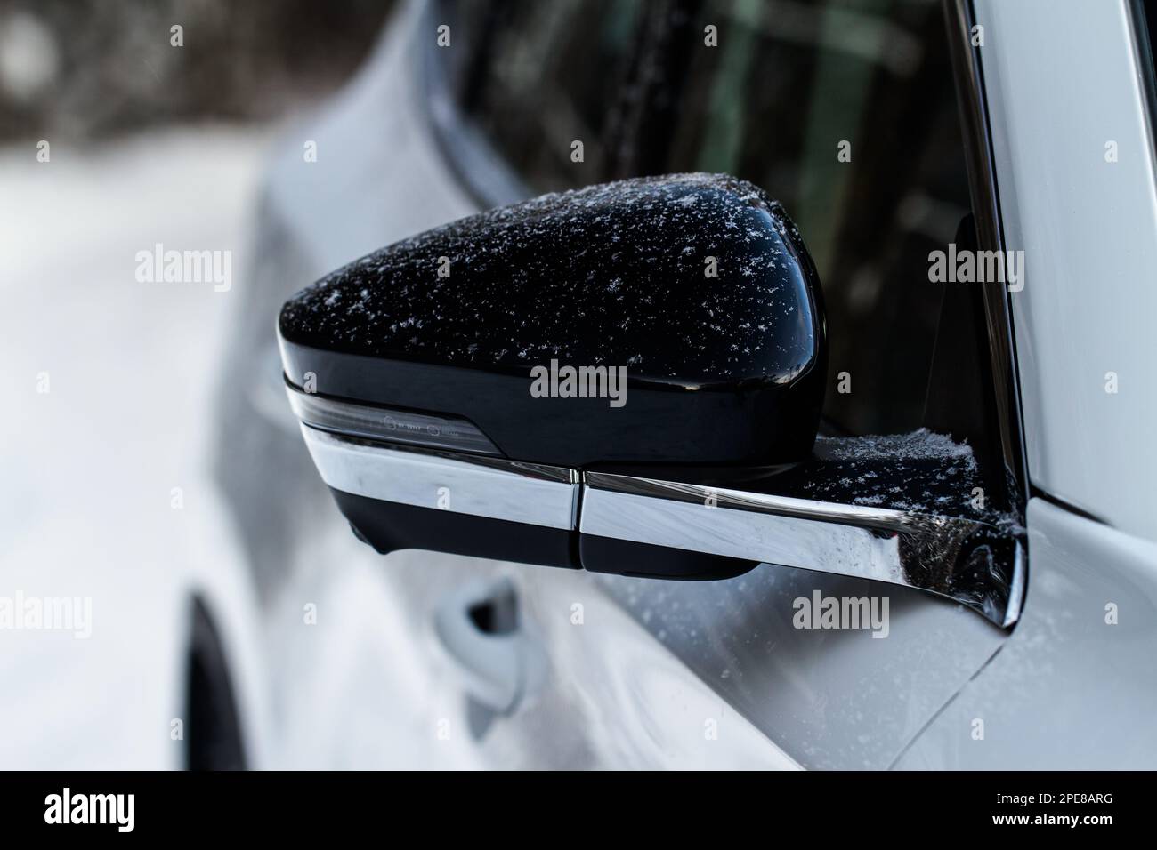 Close up front view of car side mirror. Front rear view mirror on the ...