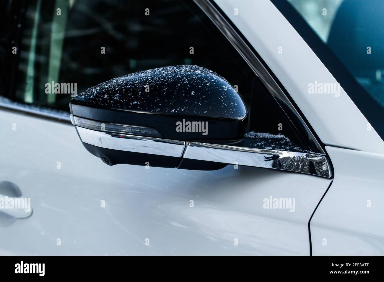 Side rear-view mirror on a modern car. Closeup photo of a car mirror ...