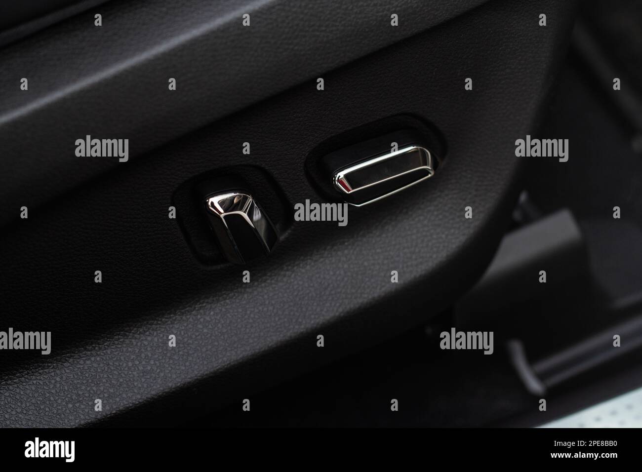Electric car seat adjustment control panel close up view. Adjustable ...