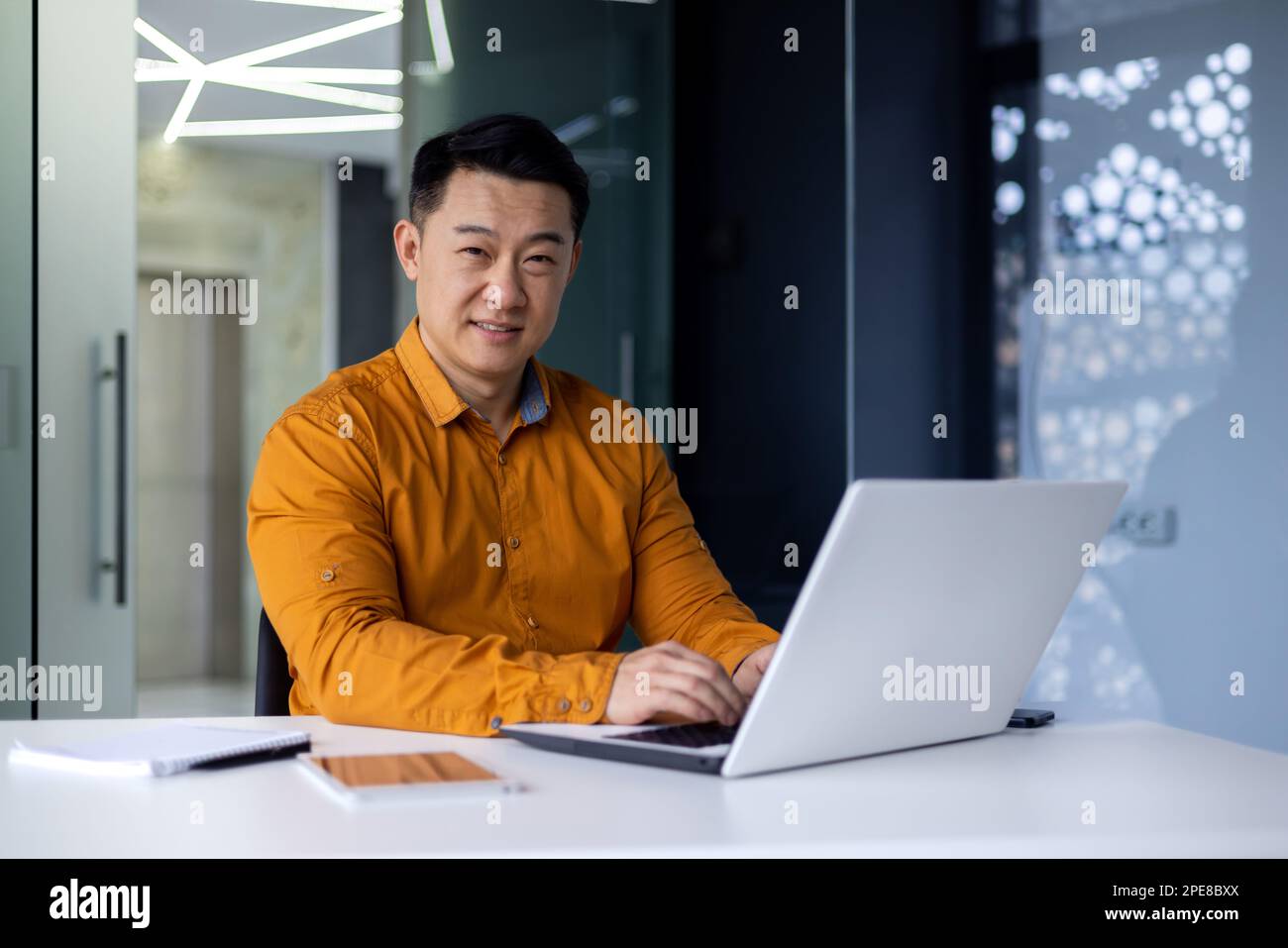 Senior asian man coding programming hi-res stock photography and images ...