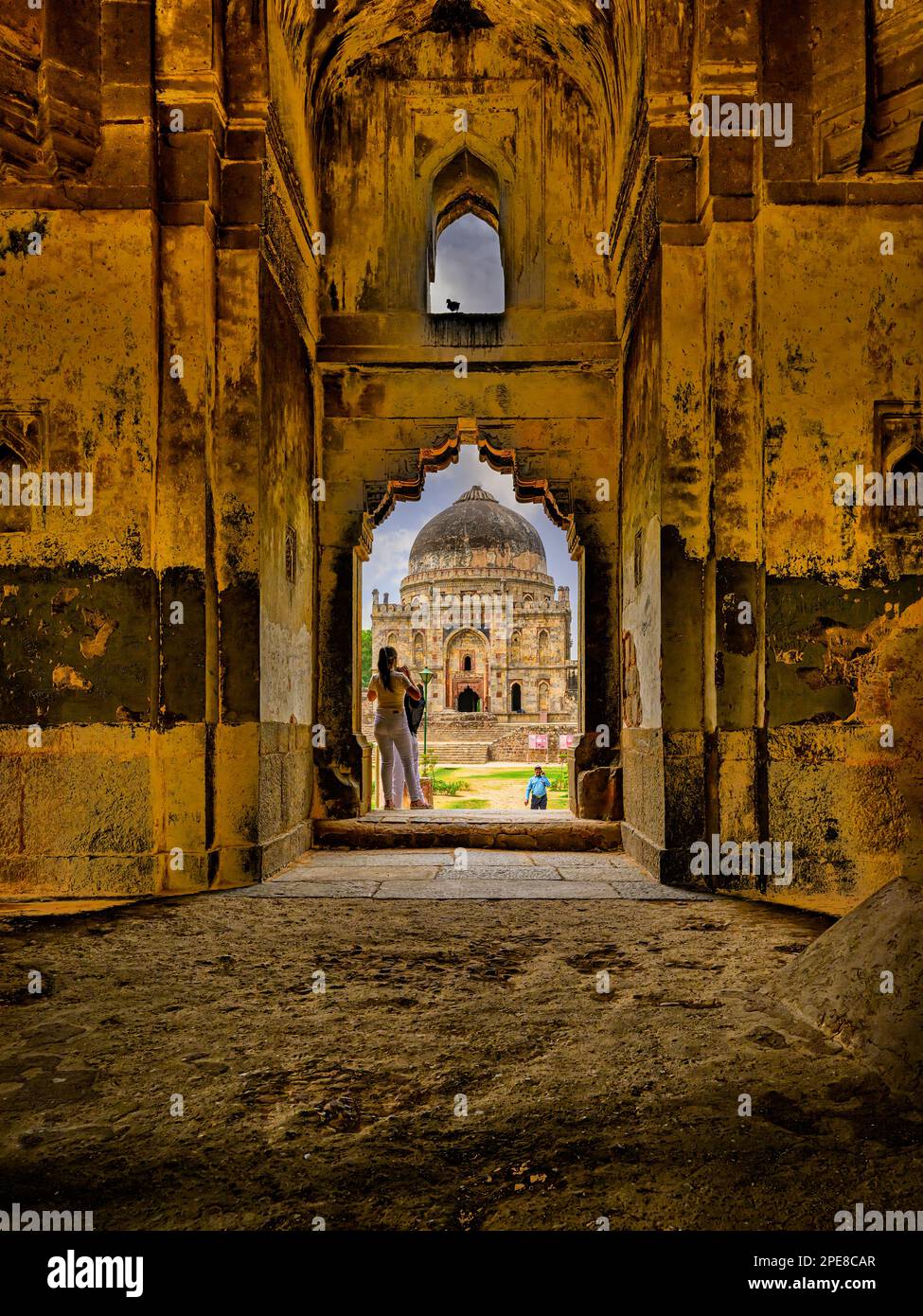 Looking towards the Bara Gumbad from the interior of the Shish Gumbad ...