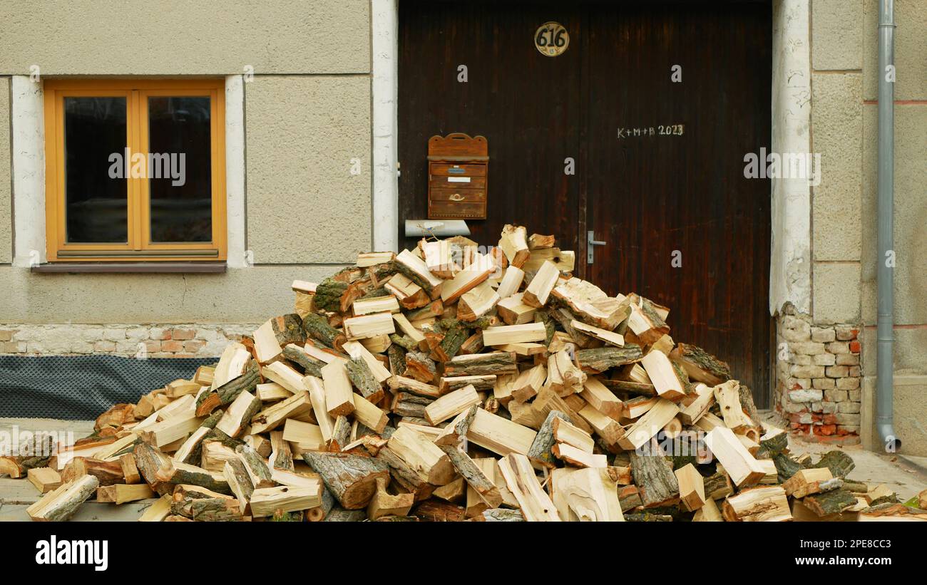 Chopped firewood logs stacked pile wood poplar storage for heating ...