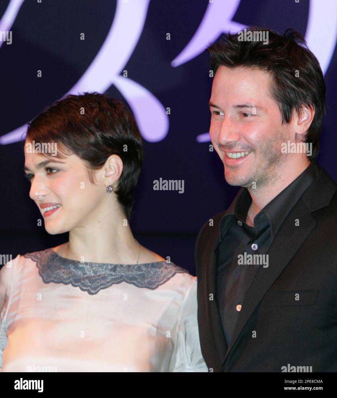 American film star Keanu Reeves and actress Rachel Weisz smile for ...