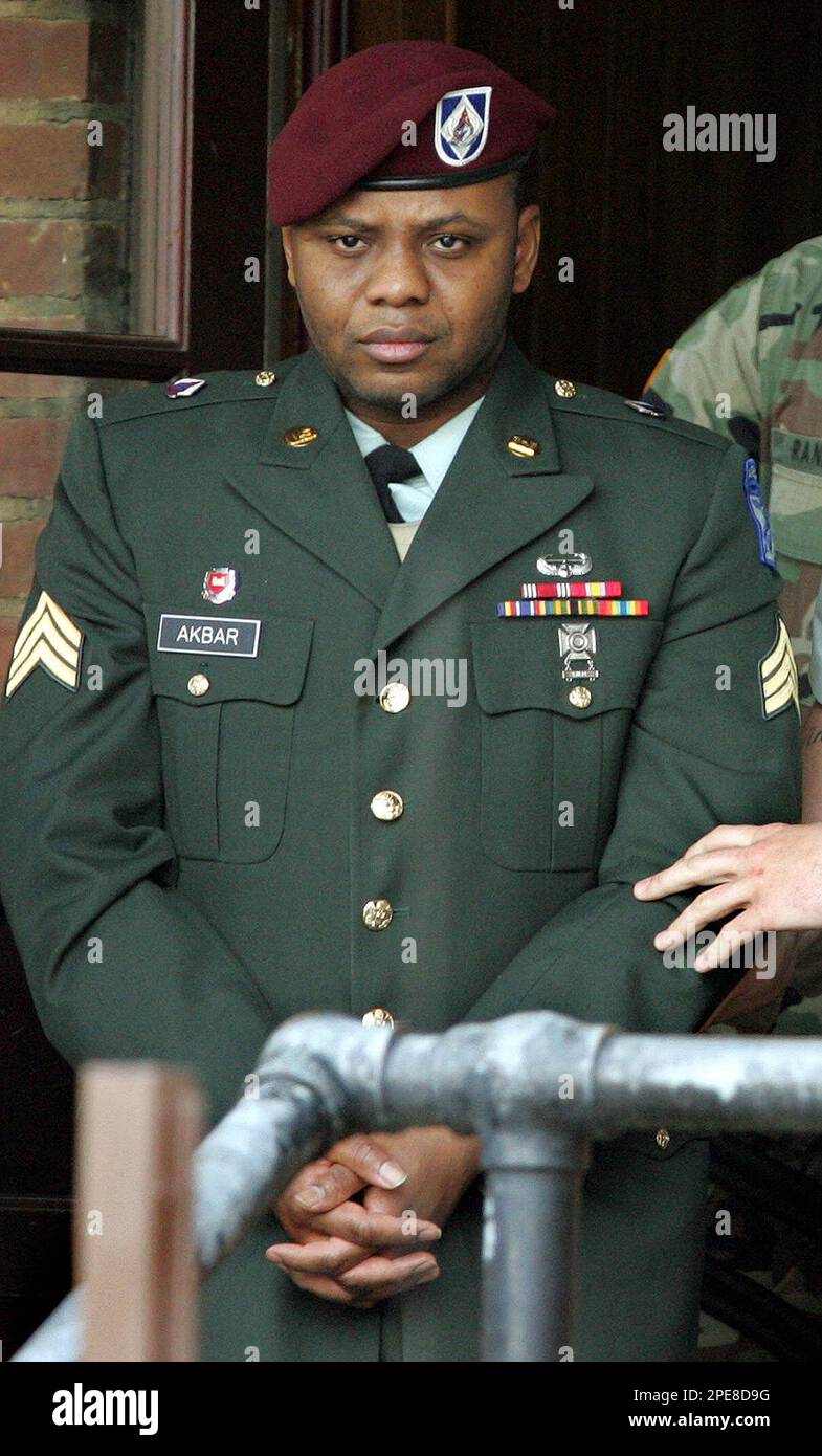 Sgt. Hasan Akbar is led from the Staff Judge Advocate Building at Fort ...