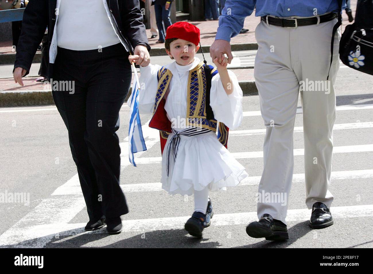 Constantinos Tsiotos, 4, center, of Winthrop, Mass., wearing ...