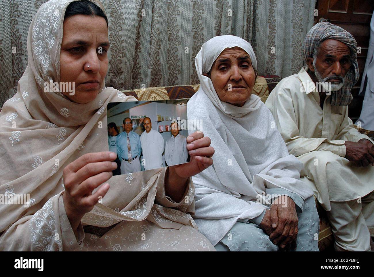 Family members of Malik Mohammad Javed, a Pakistani diplomat kidnapped ...