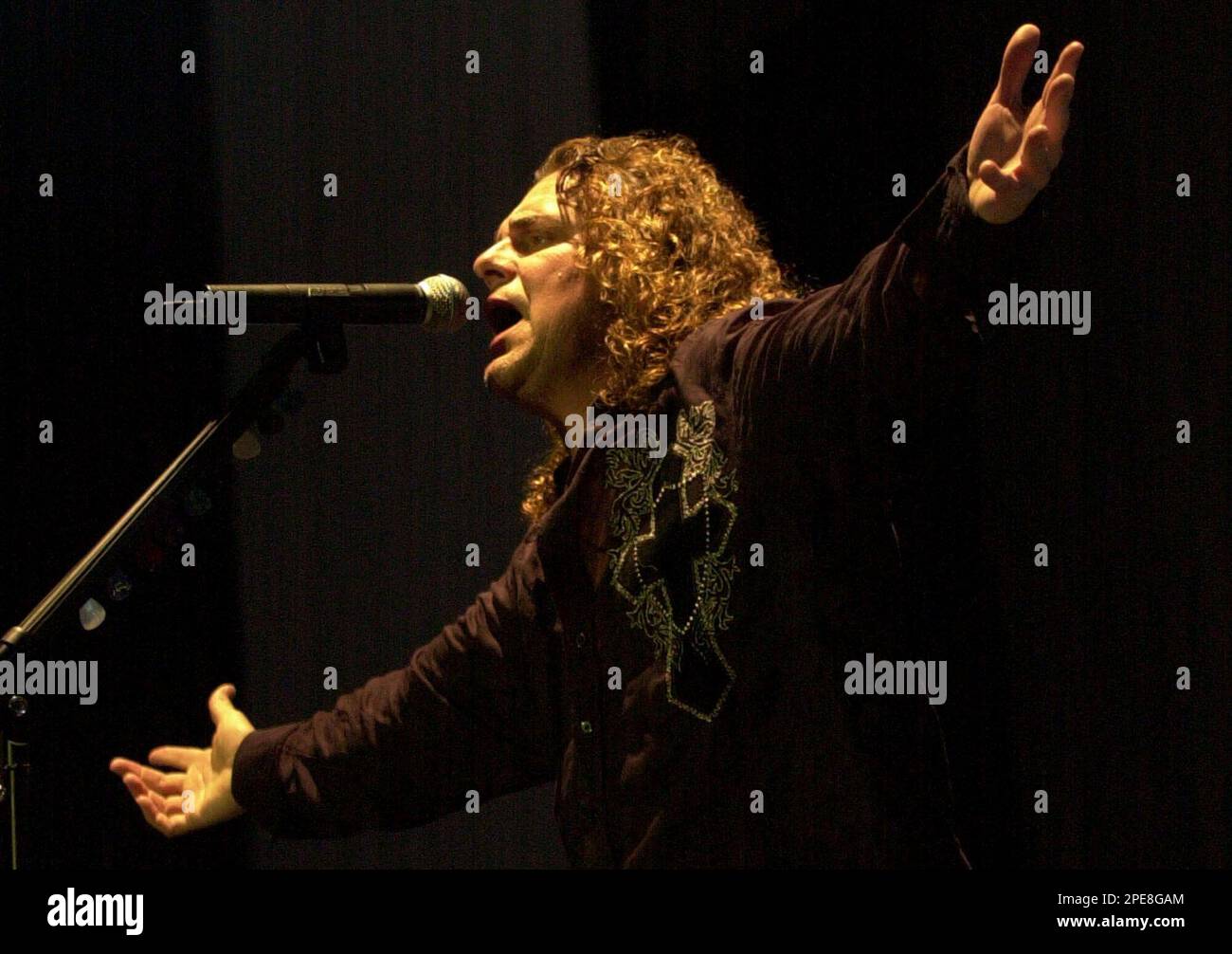 Fernando Olvera, lead singer of Mexican band Mana, performs in Caracas ...