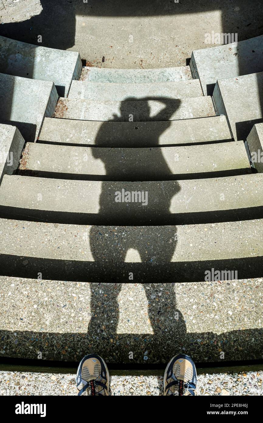 Drop Shadow Of Photographer On Stairs Stock Photo - Alamy