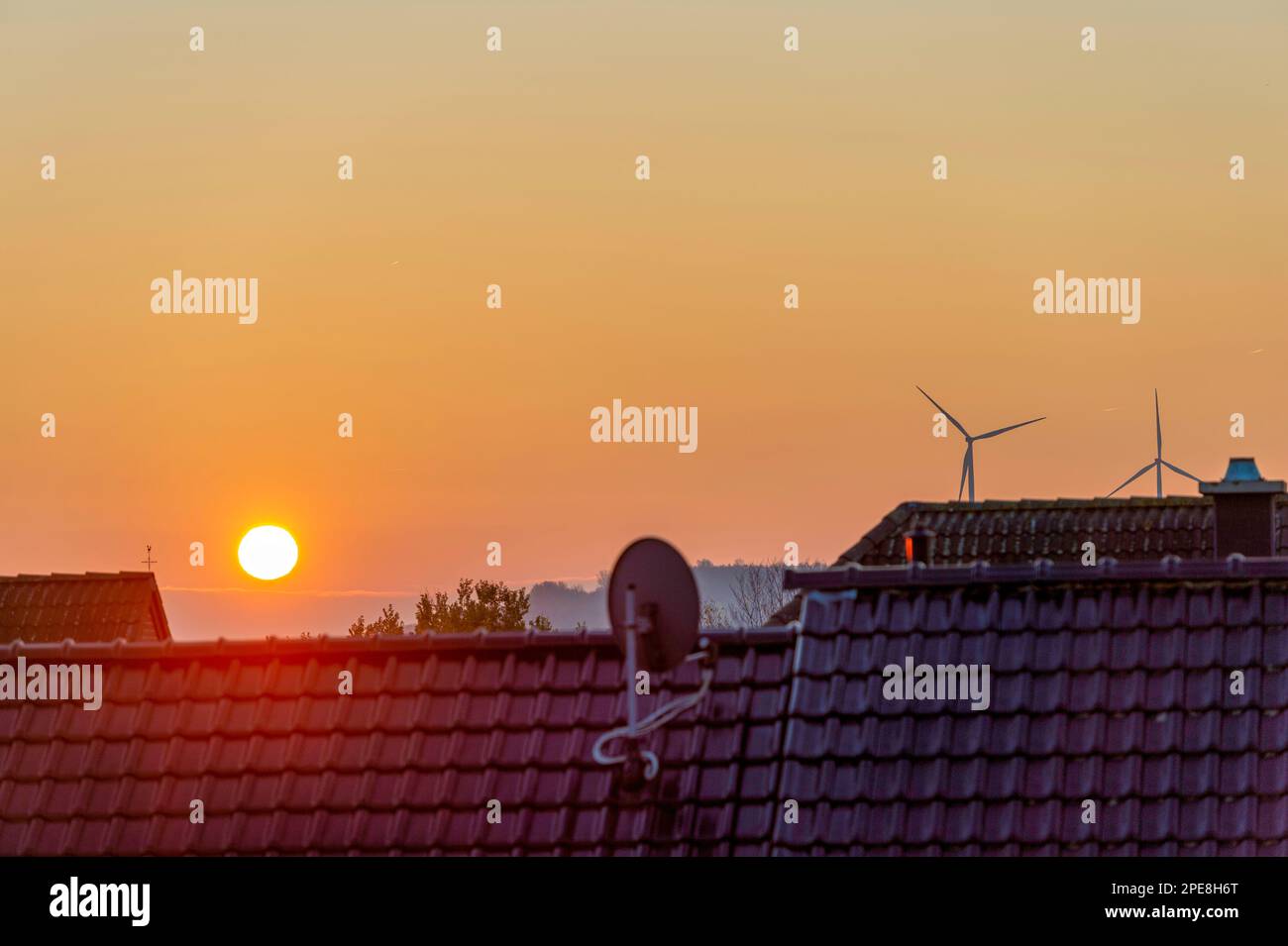 Sunrise Over The Rooftops Stock Photo - Alamy
