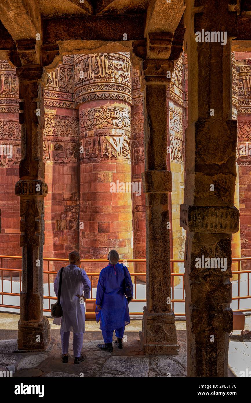 Gazing in awe at the elaborate exterior of the Qutb Minar minaret ...