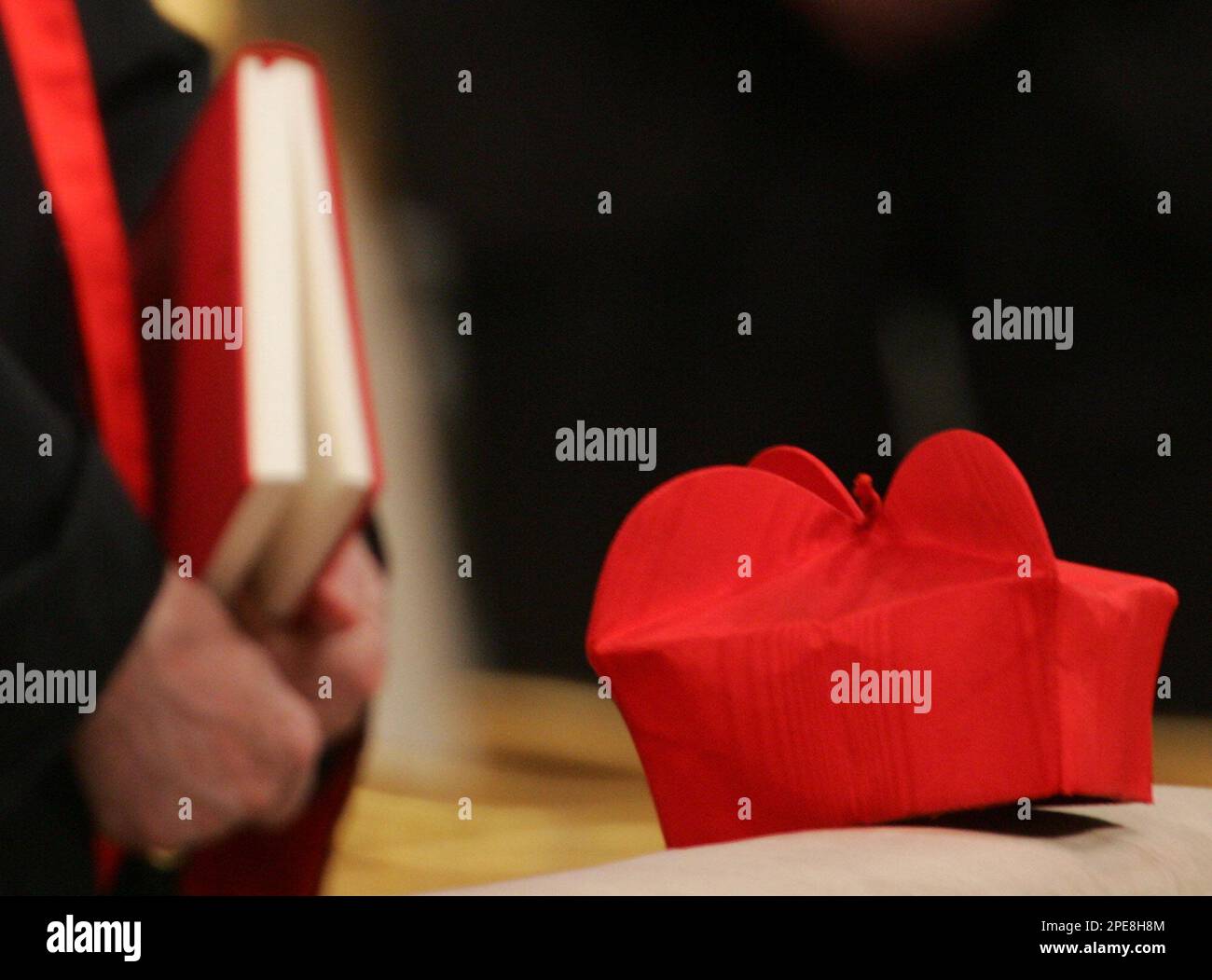 A Cardinal's biretta, the traditional hat worn by Roman Catholic clergy ...