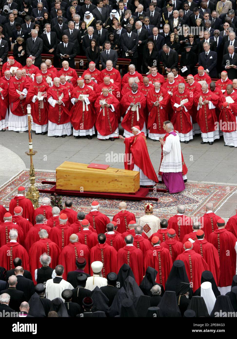 German Cardinal Joseph Ratzinger blesses the casket of Pope John Paul ...
