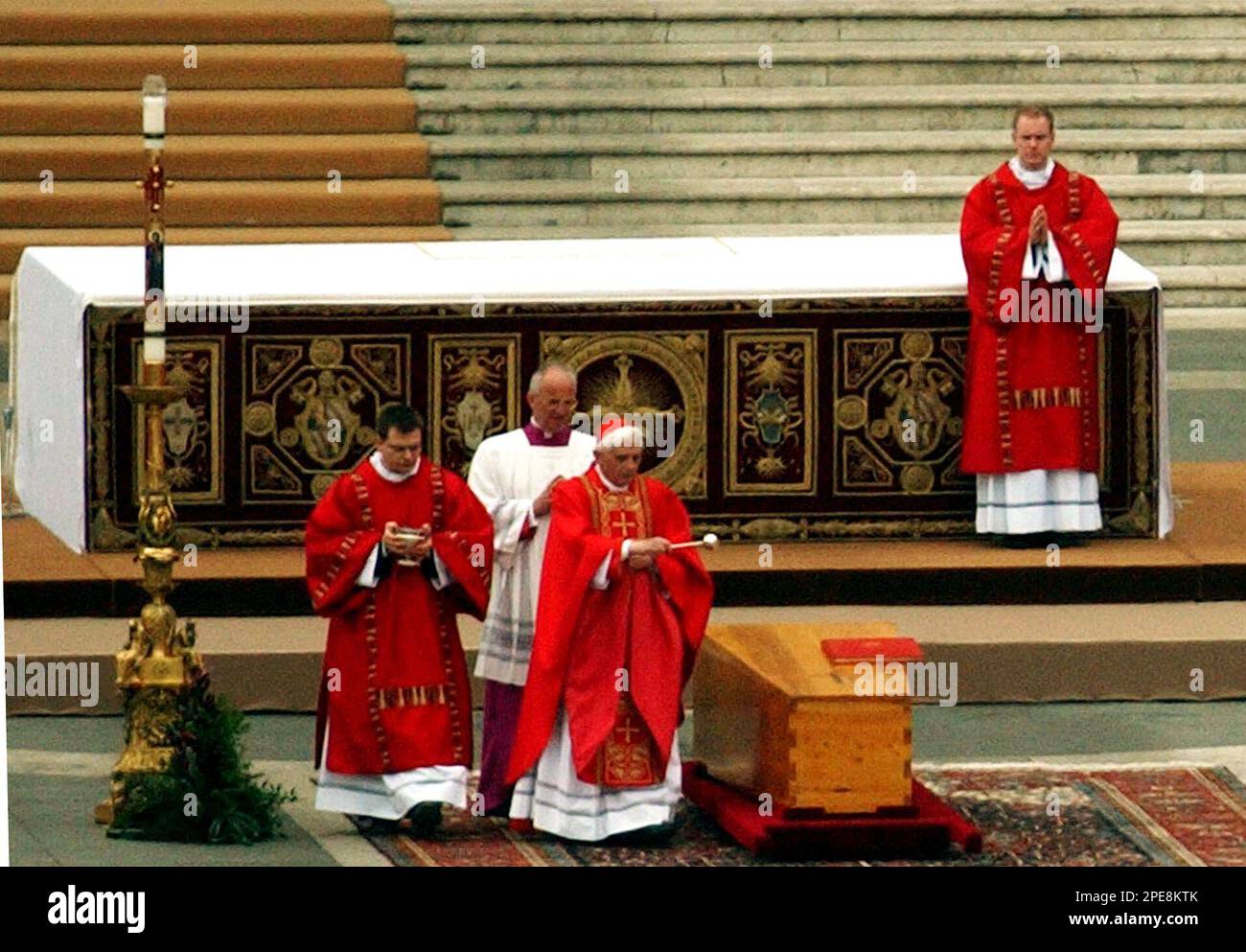 German Cardinal Joseph Ratzinger blesses the coffin of Pope John Paul ...