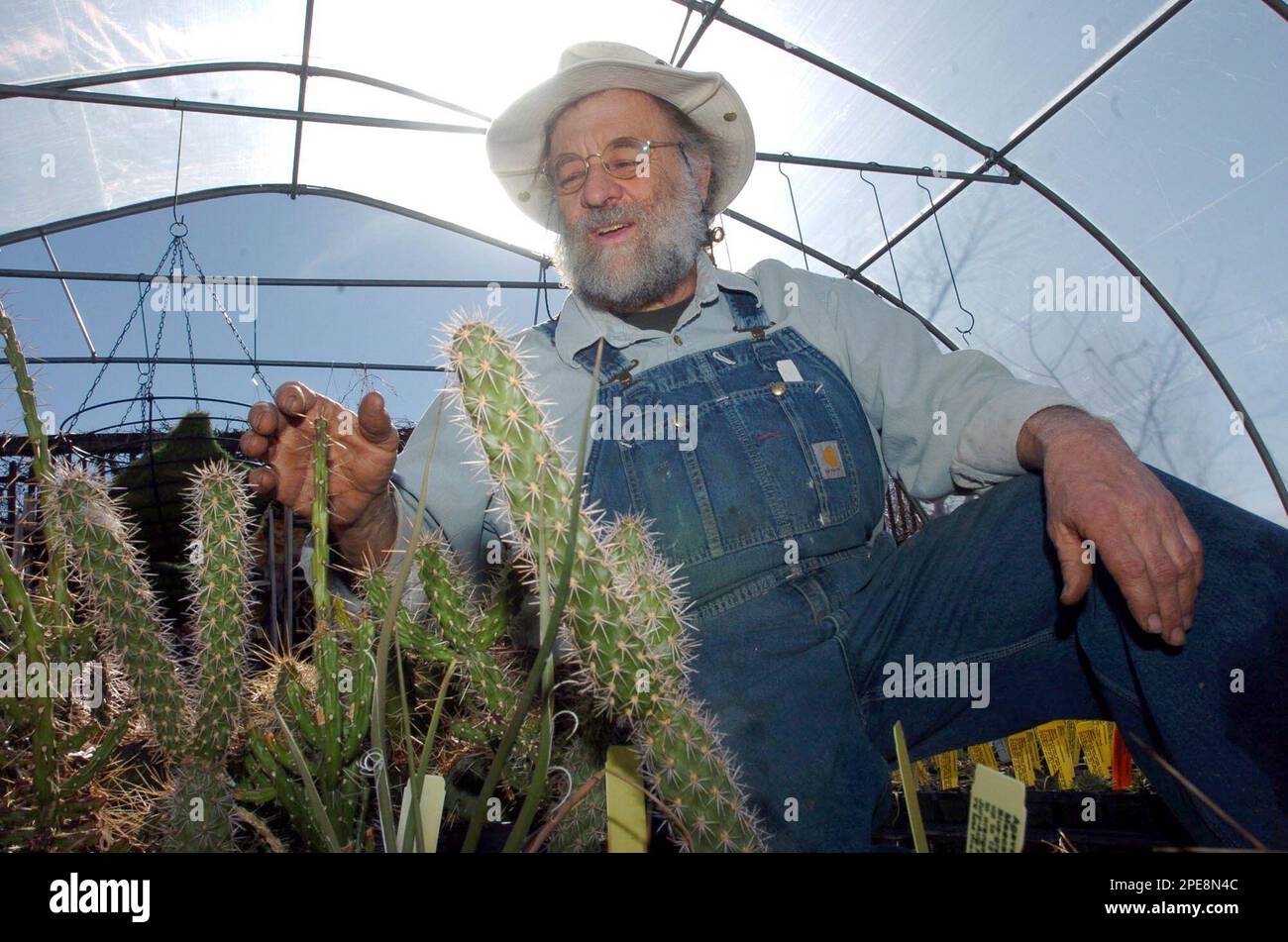 Bob Pennington of Agua Fria Nursery, checks on a greenhouse where he ...