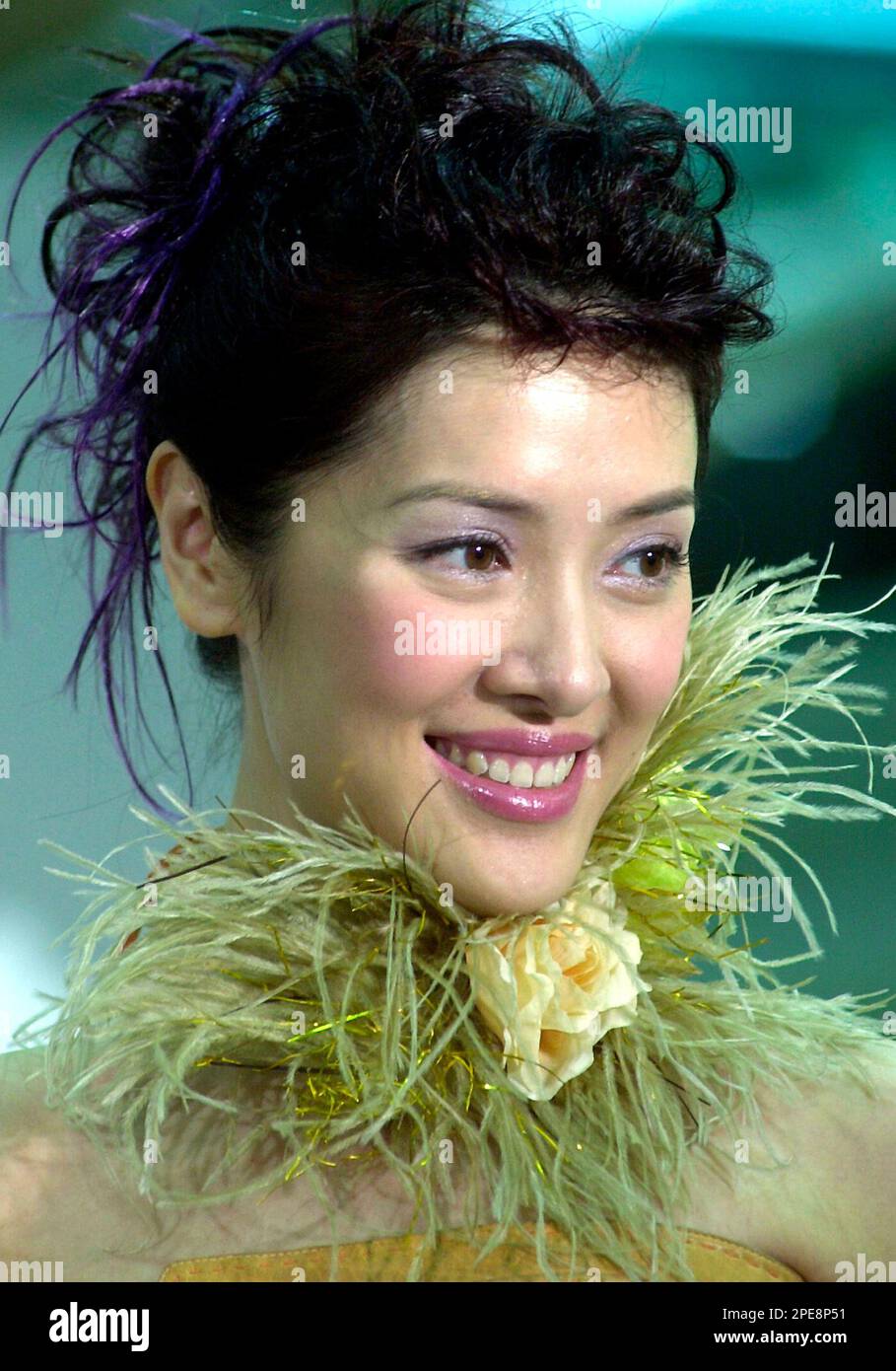 Former Miss Hong Kong Anne Heung poses for photographers at a press ...