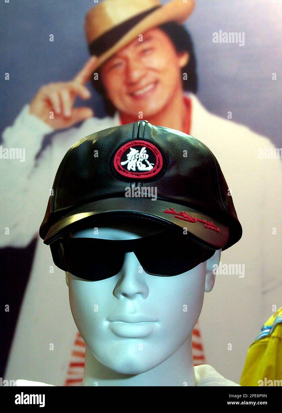 A mannequin wearing a cap under Jackie Chan's clothing line stands ...