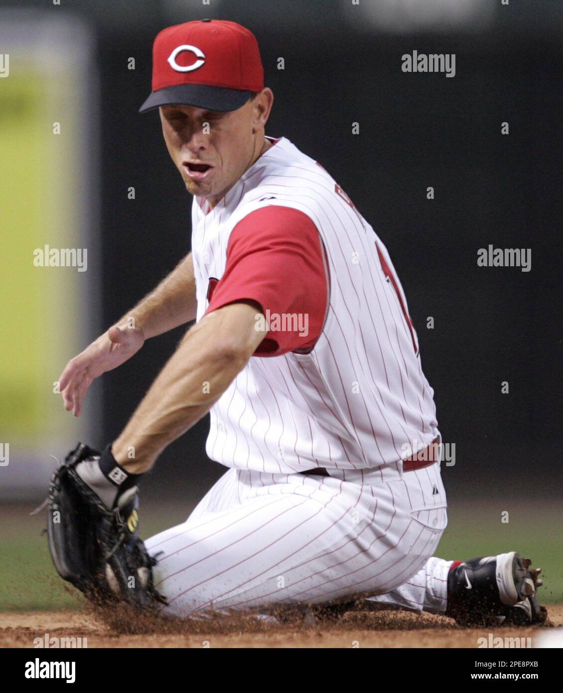 Cincinnati Reds third baseman Joe Randa catches a line drive hit by New ...