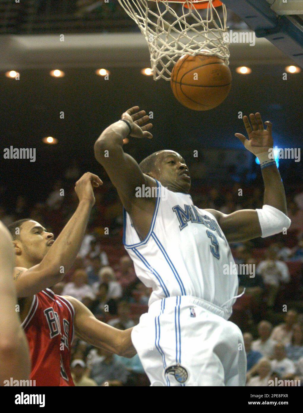 Orlando Magic guard Steve Francis, right, and Chicago Bulls center ...