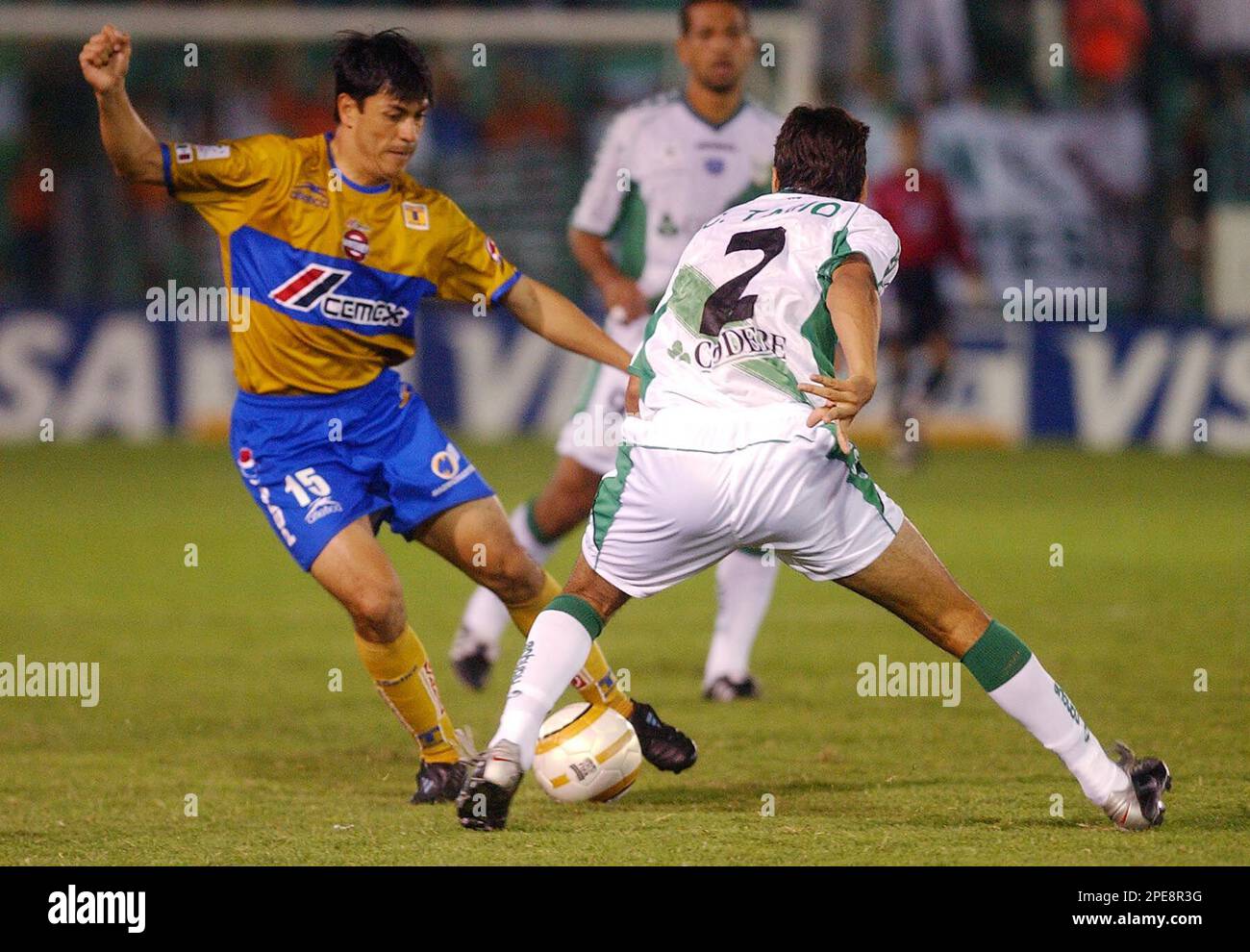 Mexico's Mario Ruiz, left, of Tigres UANL of Monterrey, moves the ball ...