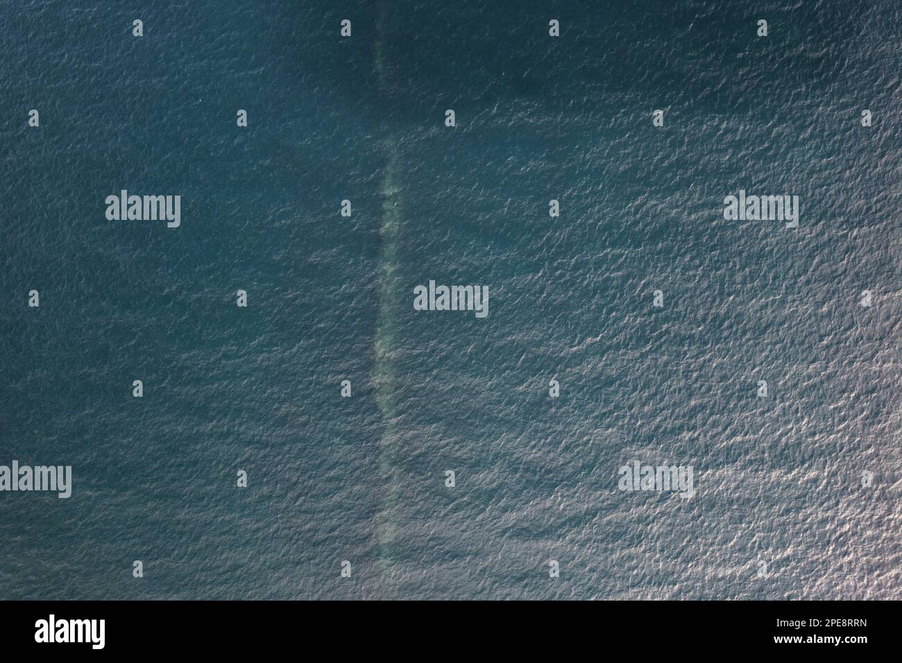 Deep blue sea water texture wide drone above view Stock Photo - Alamy