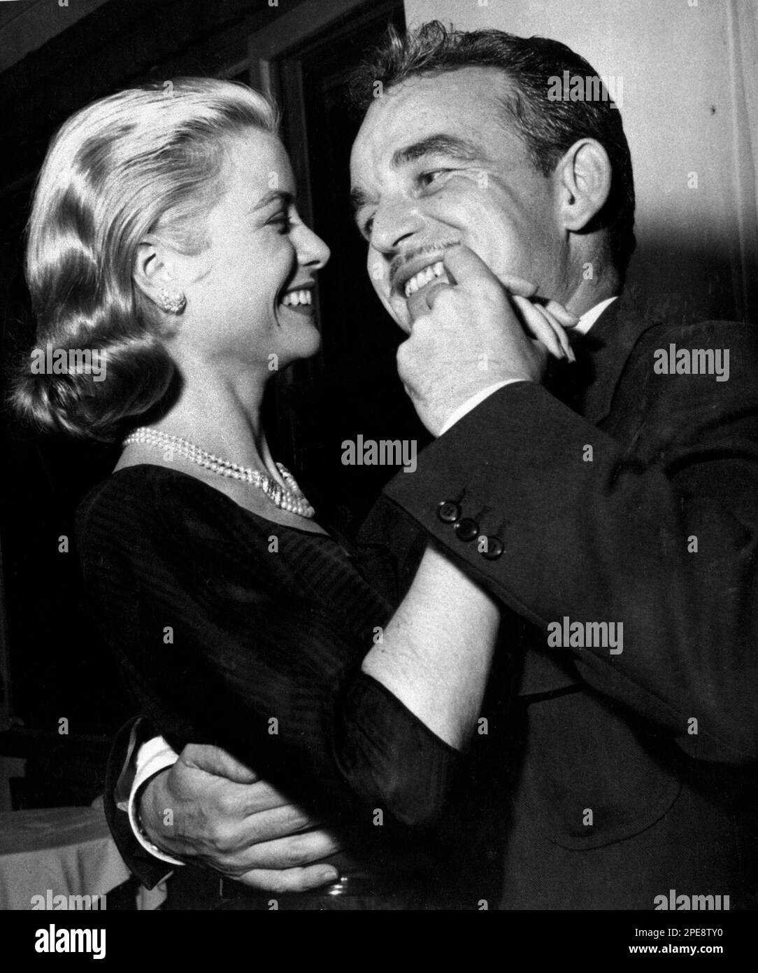 Prince Rainier III of Monaco and Grace Kelly dance at a party at the ...