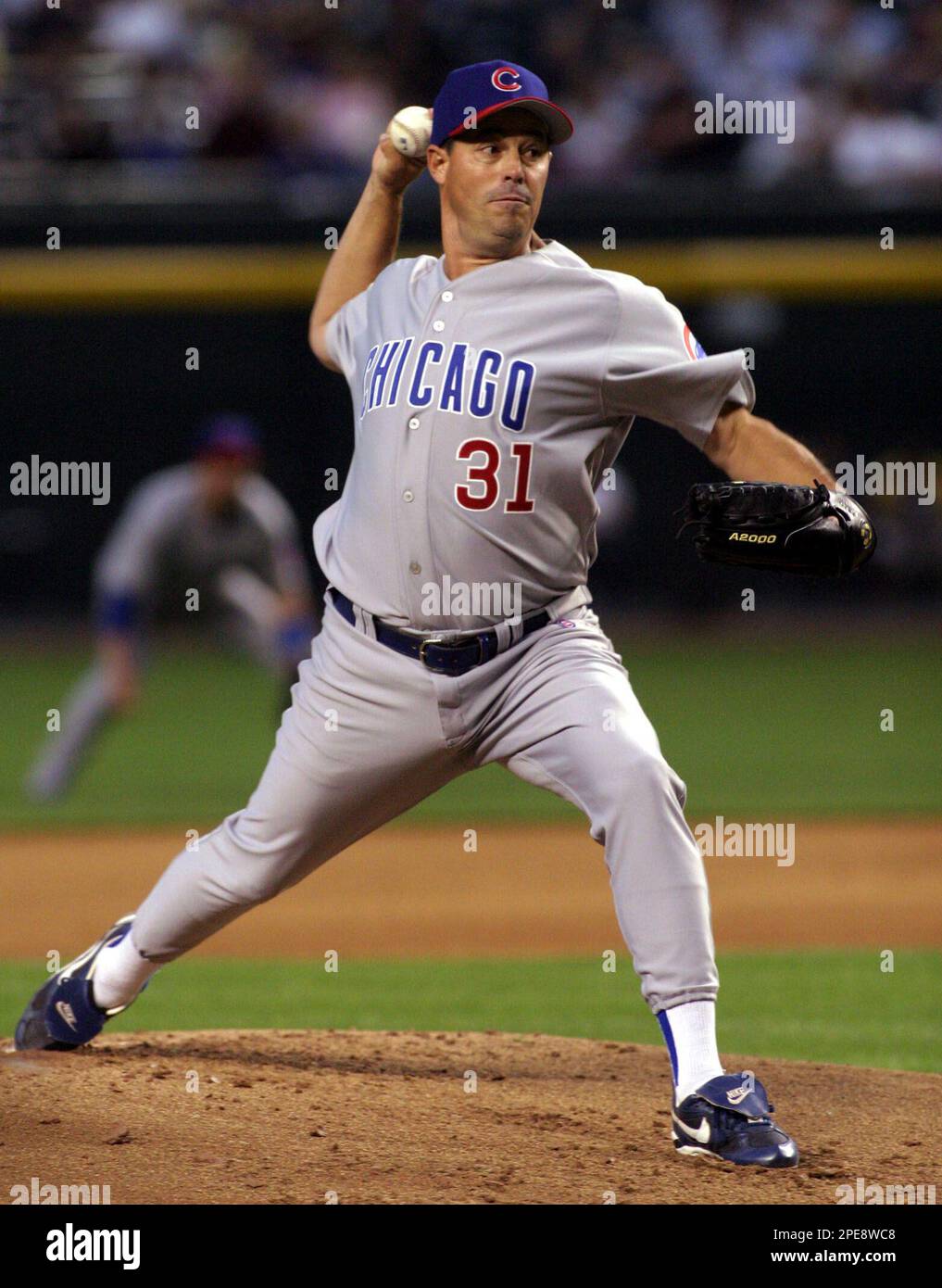 Chicago Cubs' Greg Maddux, delivers a home run pitch to Arizona ...