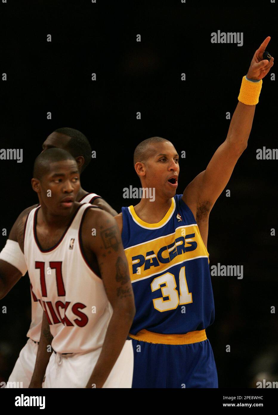 Indiana Pacers' Reggie Miller (31) gestures before the start of the ...