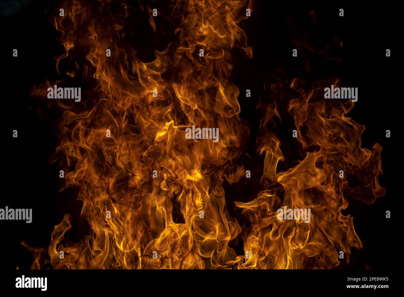 Blaze burning fire flame on art texture background Stock Photo - Alamy
