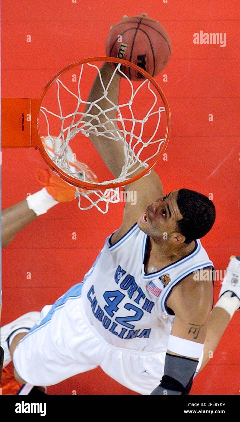 North Carolina's Sean May goes up for a dunk in the first half against ...
