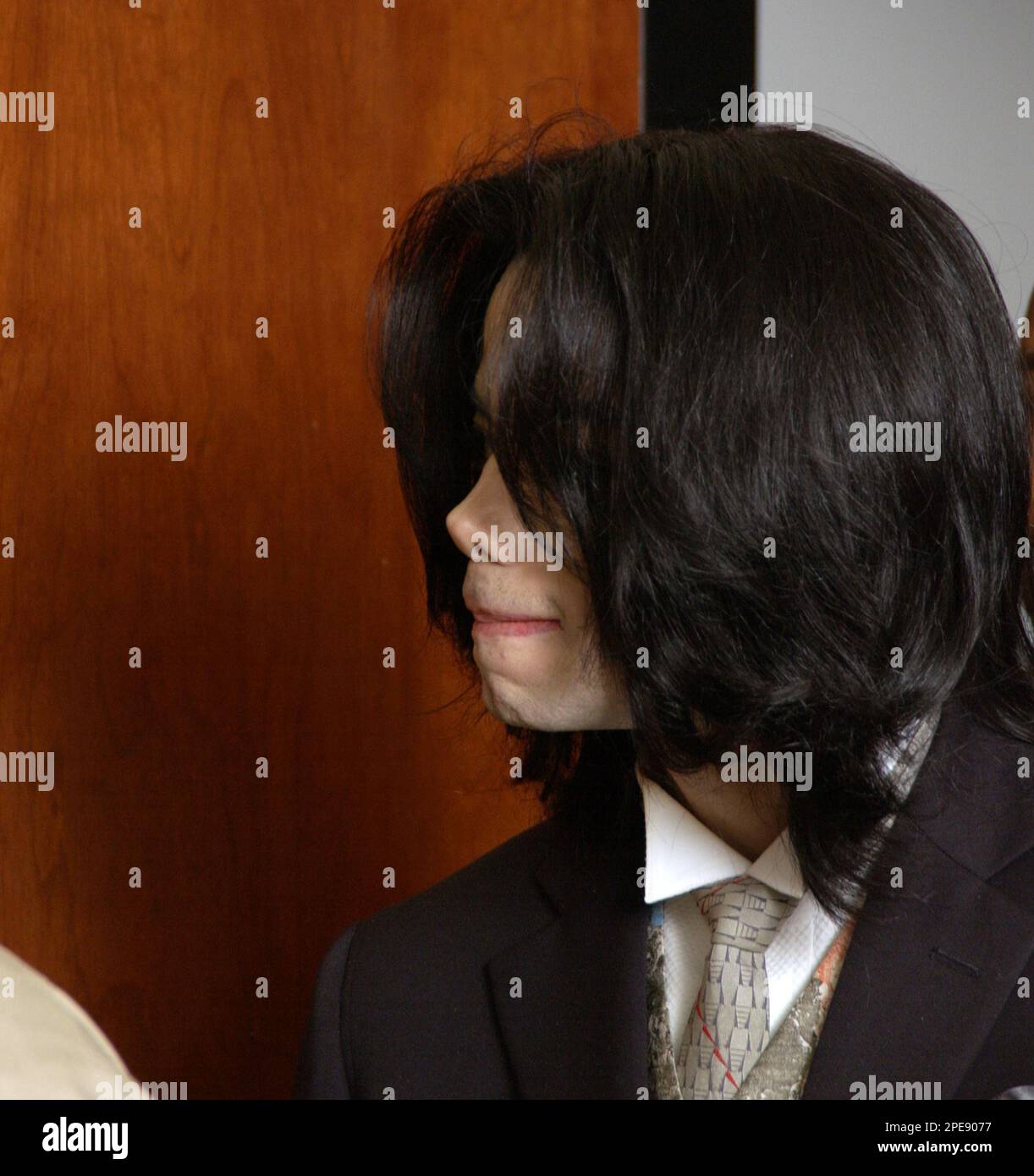 Michael Jackson leaves the courtroom during a break in testimony in his ...