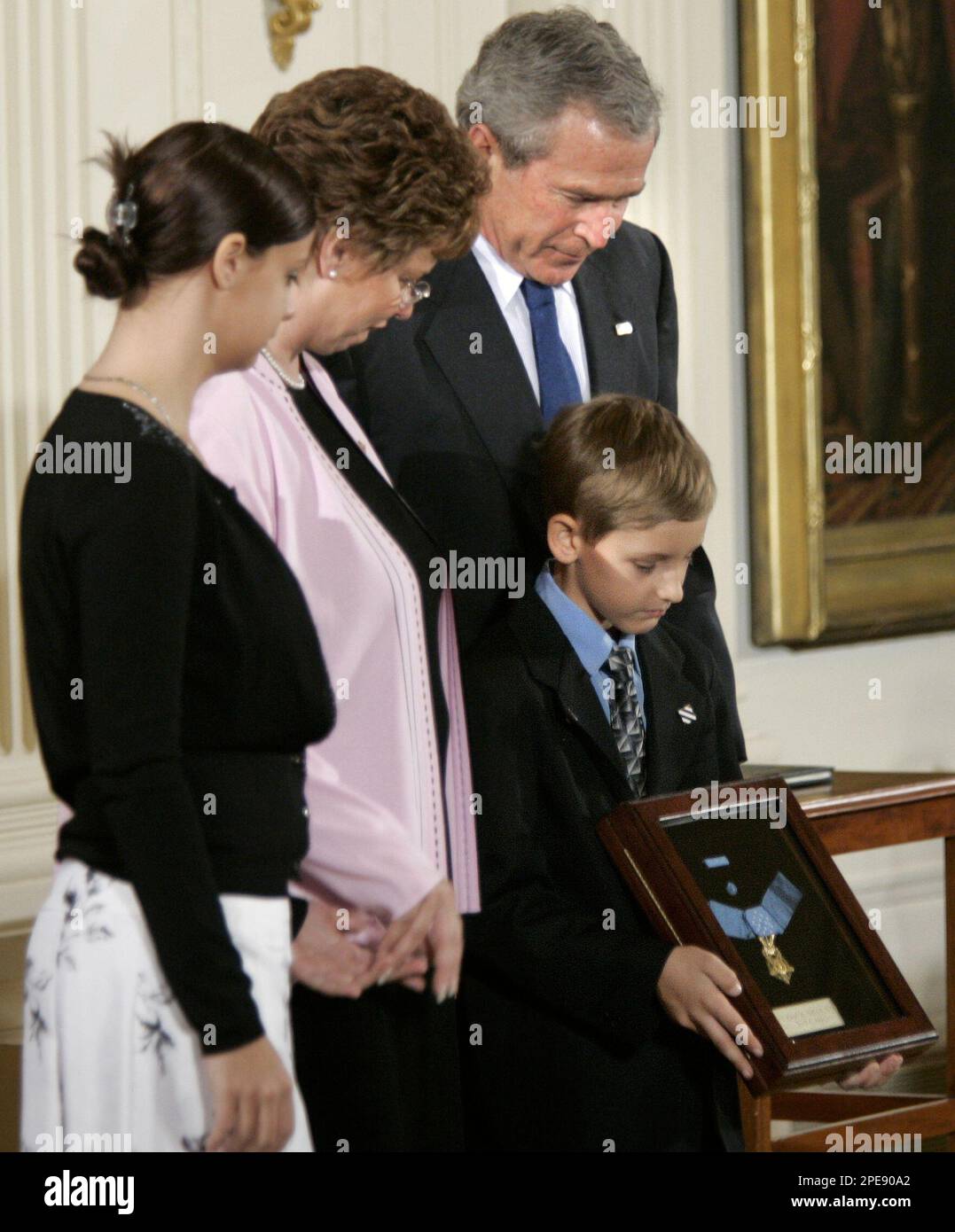 President Bush awards the first Medal of Honor for service in the Iraq ...
