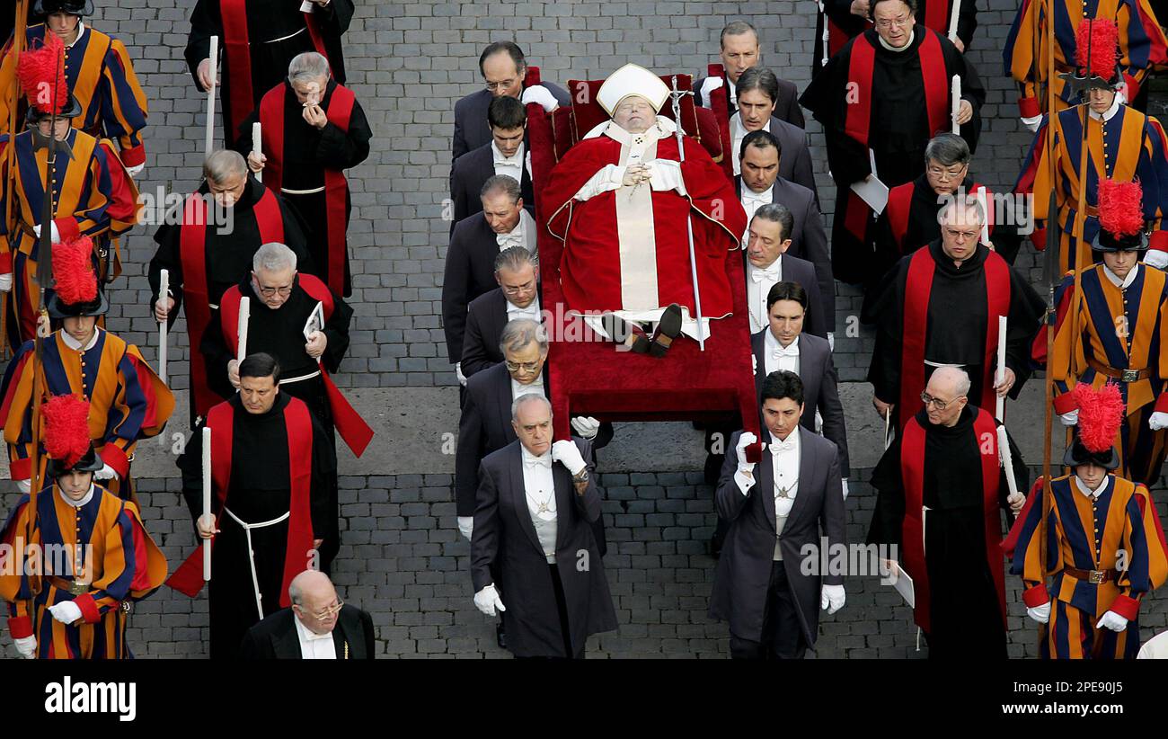Late Pope John Paul II is carried to St. Peter's Basilica at the ...