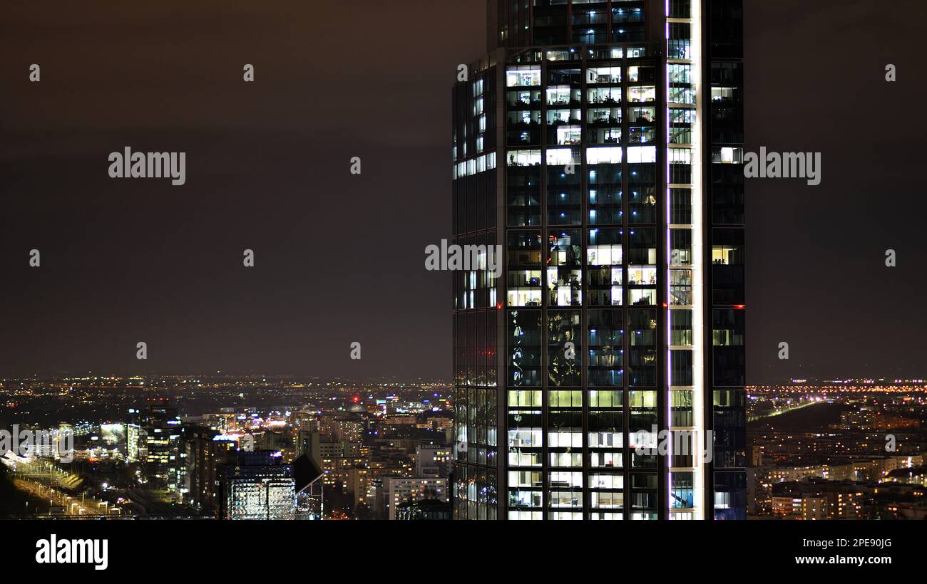 View of at night glass buildings and modern business skyscrapers,. View ...