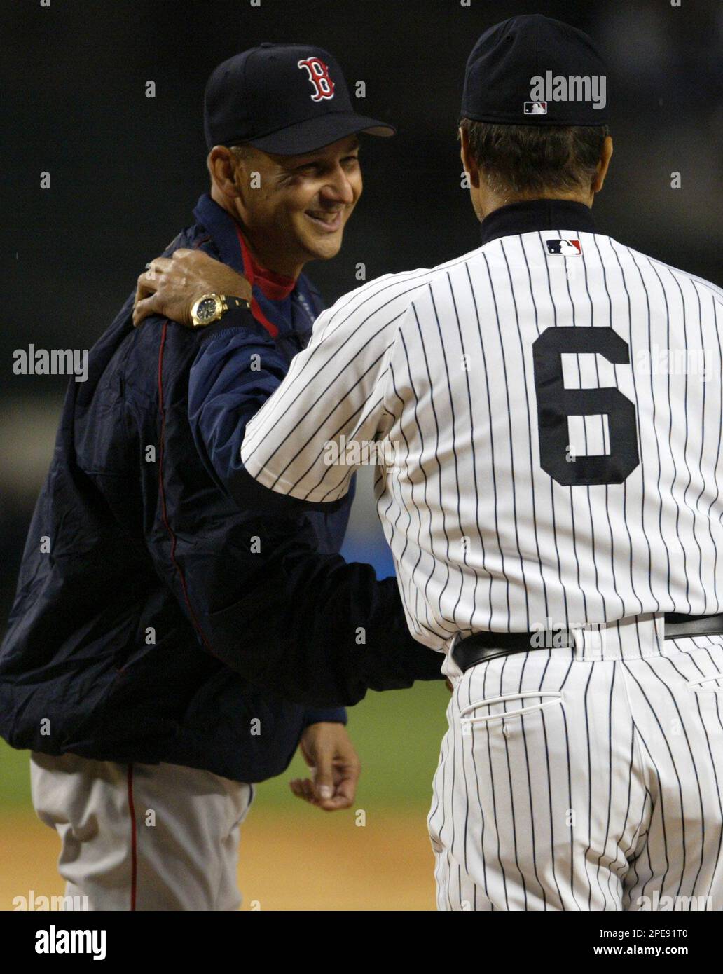 New York Yankees manager Joe Torre, right, welcomes Boston Red Sox ...