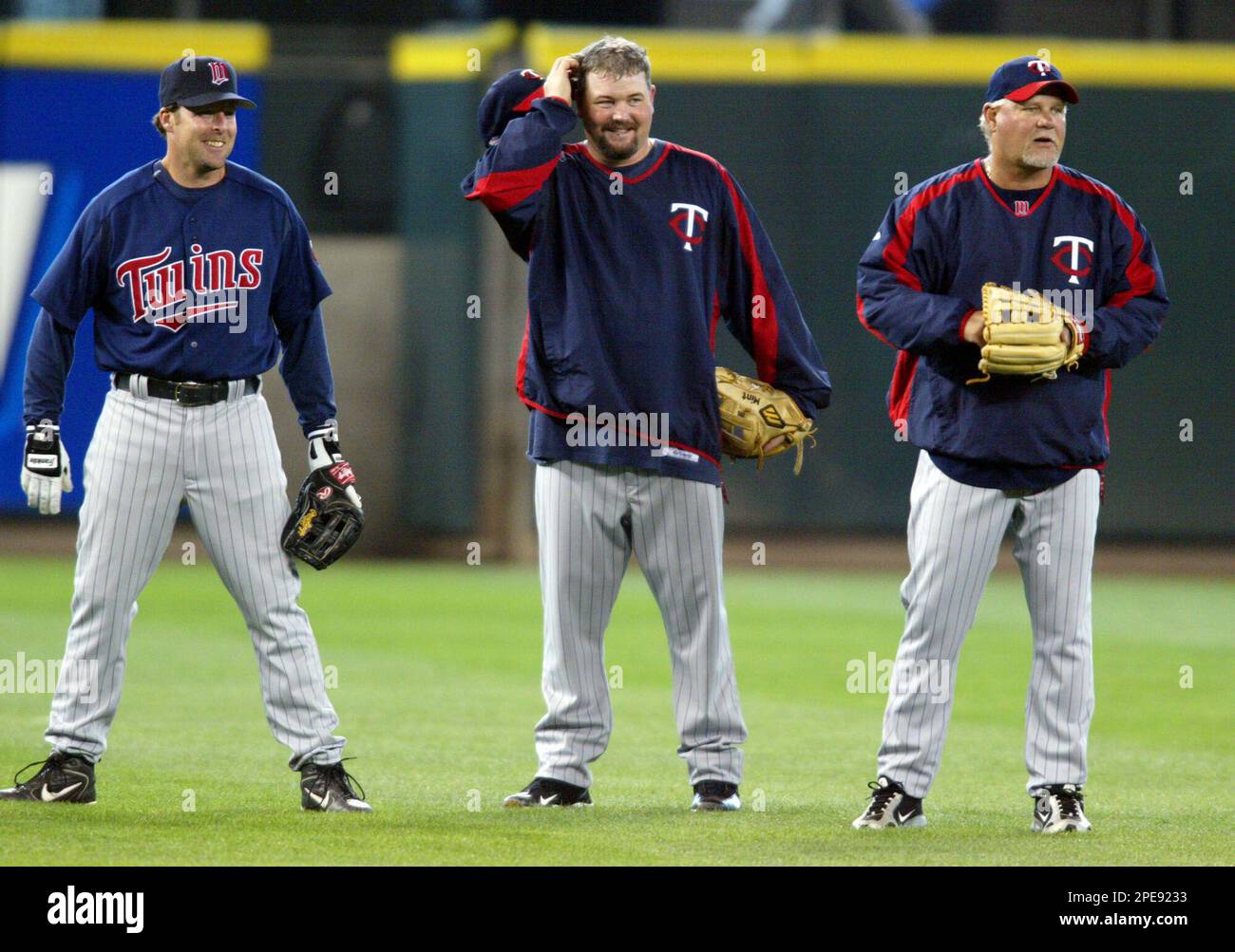 Minnesota Twins' Mike Redmond, left, Matthew LeCroy, center, and ...