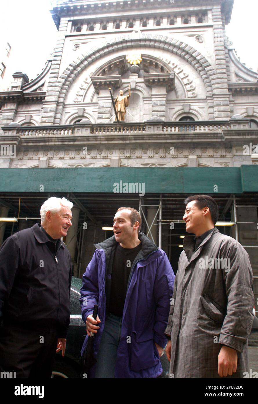John Sullivan, left, Eugene Jen, middle, and Mike Cusack chat outside ...