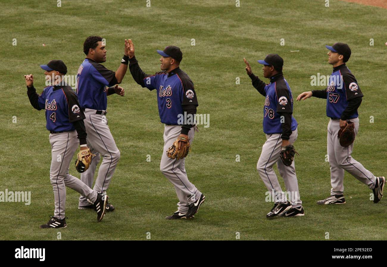 Members of the New York Mets celebrate after their 4-3 exhibition game ...
