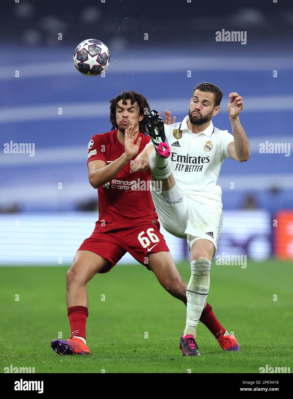 Liverpool's Trent Alexander-Arnold (left) and Real Madrid's Nacho ...