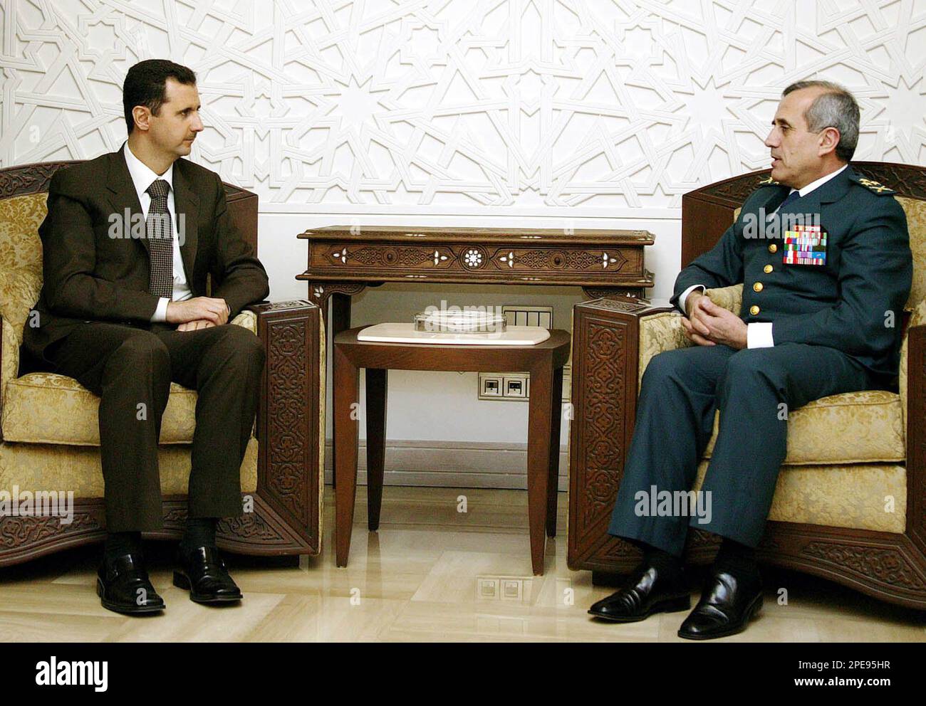 Syrian President Bashar Assad, left, meets with the Lebanese Army ...