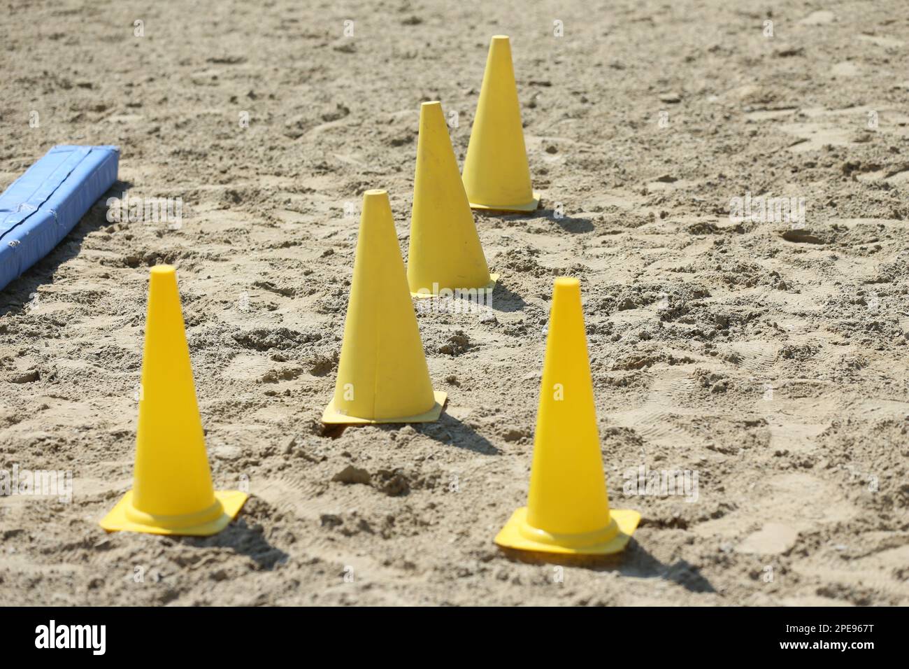 Obstacles and buoys in the sand in an empty equestrian center Stock ...