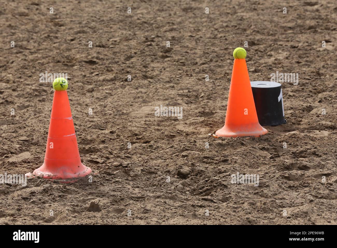 Obstacles and buoys in the sand in an empty equestrian center Stock ...